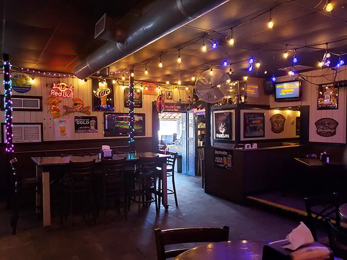 String lights dance across the ceiling while beer signs stand guard. This isn't interior decoration—it's a warm hug disguised as a restaurant.