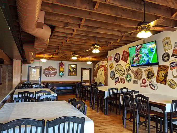 Exposed wooden beams and vintage beer signs create that perfect "maritime meets Pittsburgh" vibe – like a ship captain's quarters that happens to show the Steelers game.