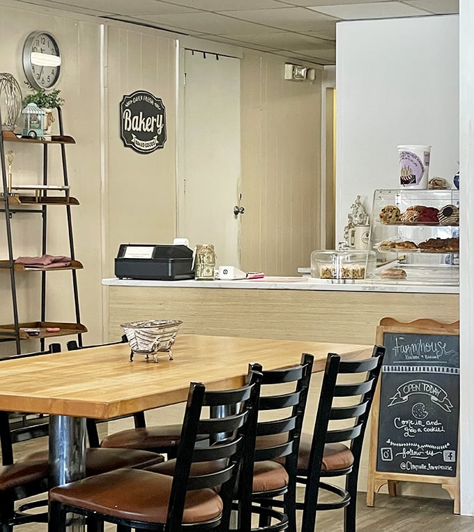 Wooden tables, ladder shelves, and that bakery sign promising sweet salvation – this isn't just a restaurant, it's a morning sanctuary.