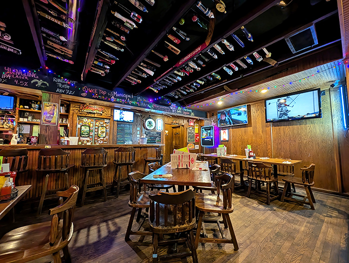 Decades of good times hang from the ceiling in tap handle form, while wood-paneled walls hold the whispered secrets of countless Miami University celebrations. 
