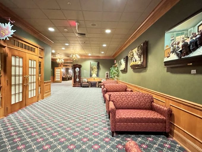 The lobby's warm wood paneling and comfortable seating offer a moment of calm before the delicious storm that awaits beyond those doors.