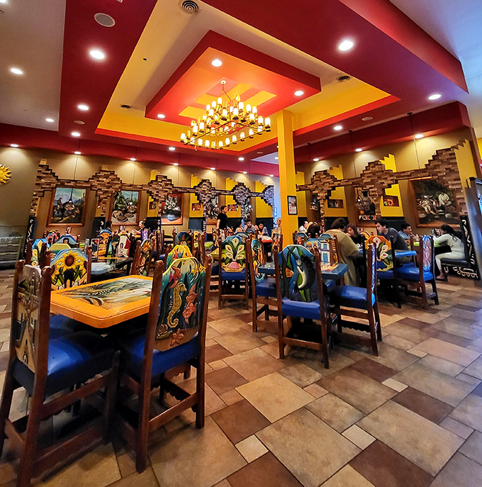 Step inside and the vibrant red and yellow ceiling treatment announces you're not in Delaware anymore—you've been transported to a colorful Mexican celebration.
