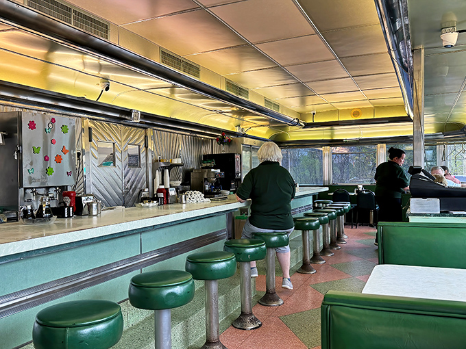 The counter seats at Dean's aren't just places to eat—they're front-row tickets to the greatest show on earth: American diner cooking in action.