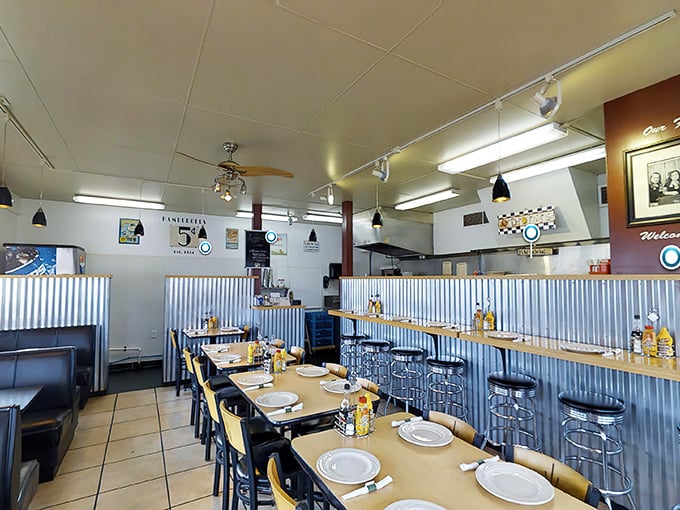 Inside, the corrugated metal wainscoting and classic diner setup create that perfect "I've been coming here for decades" vibe, even on your first visit.