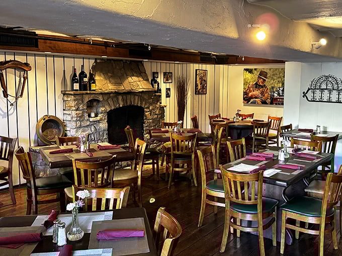 Step inside to a warm embrace of wood-paneled walls, stone fireplaces, and tables set for memorable meals—comfort incarnate in restaurant form.