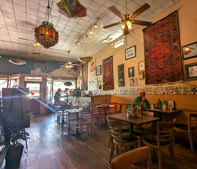 Colorful chandeliers dance overhead while Oriental rugs adorn the walls—this isn't your cookie-cutter diner, but a place with personality that's been earned, not manufactured.