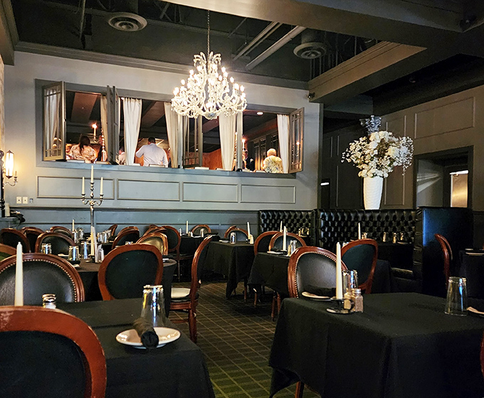 Crystal chandeliers and leather chairs set the stage for culinary drama. This isn't just dinner—it's theater where the steak plays the starring role.
