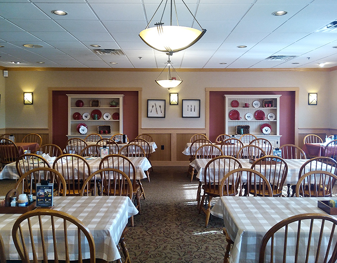 Windsor chairs and checkered tablecloths create the perfect backdrop for food-focused conversations. This dining room has witnessed countless "Oh my goodness" moments.