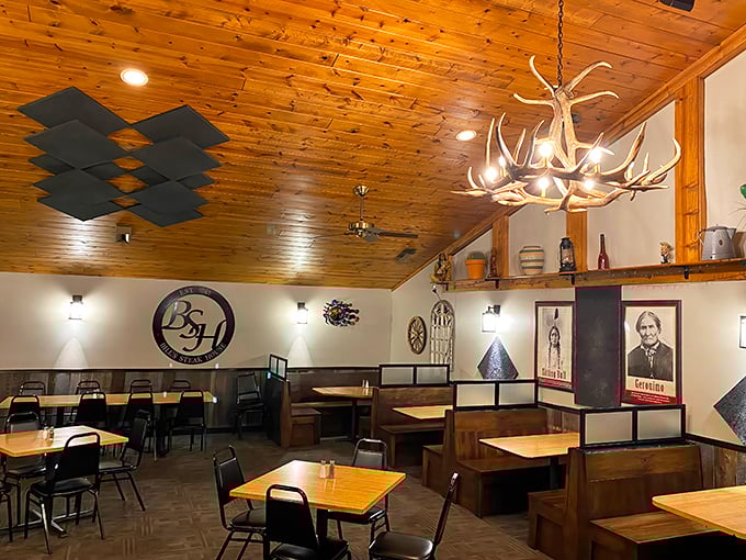 Rustic wooden ceilings, antler chandeliers, and comfortable seating create the perfect backdrop for serious eating. No pretension, just pure Michigan comfort.