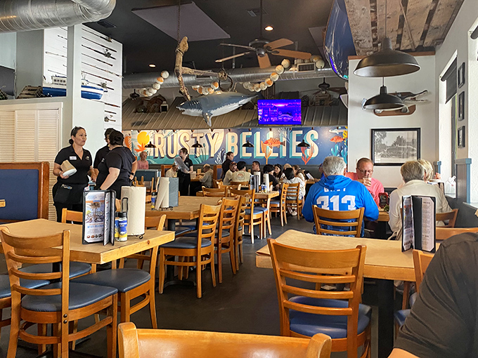 Where fishing memorabilia isn't decor—it's autobiography. That shark hanging from the ceiling has witnessed more first dates than most matchmakers.