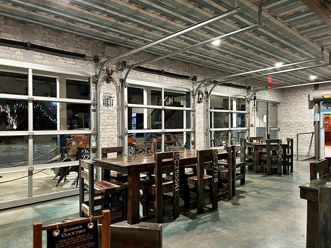 Rustic wooden tables beneath weathered ceiling planks create the perfect backdrop for seafood feasting—nautical charm without the pretension.