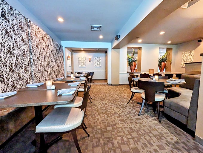Where pattern meets purpose – the dining room's distinctive wall coverings aren't just decoration, they're conversation starters that keep you talking until the food arrives.