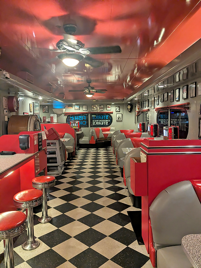 Step inside where red vinyl booths and checkered floors create the perfect backdrop for serious pancake consumption.