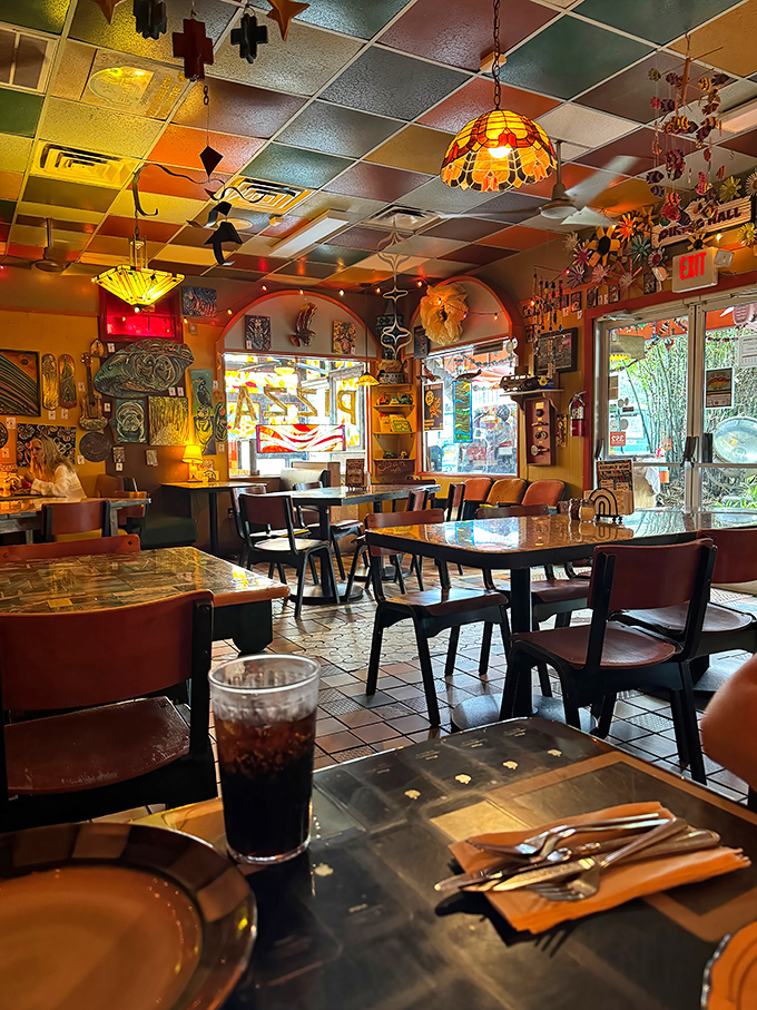 Step inside and your senses are bombarded with color – it's as if a kaleidoscope exploded and somehow improved the pizza-eating experience.