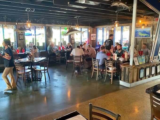 Inside Walt's, weathered wood and nautical charm create that perfect "I've discovered something special" atmosphere that keeps locals coming back for decades.