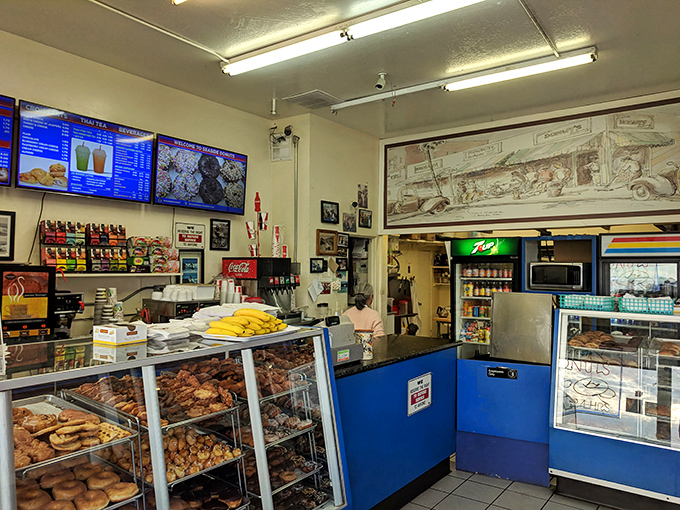Inside, the blue counter and no-frills display cases tell you everything you need to know—this place prioritizes substance over style, and locals wouldn't have it any other way.