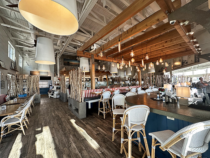 Rustic wooden beams meet modern design in a space where Lake Erie's natural beauty becomes part of the dining experience. Sunshine included at no extra charge.