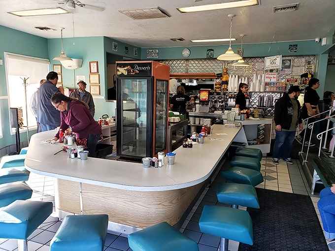 Counter culture at its finest – where turquoise vinyl stools have witnessed more morning revelations than a therapist's couch.