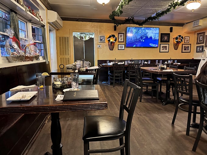 Warm golden walls, family photos, and sturdy wooden tables create that quintessential Italian eatery atmosphere—like your favorite trattoria transported to Nashville.