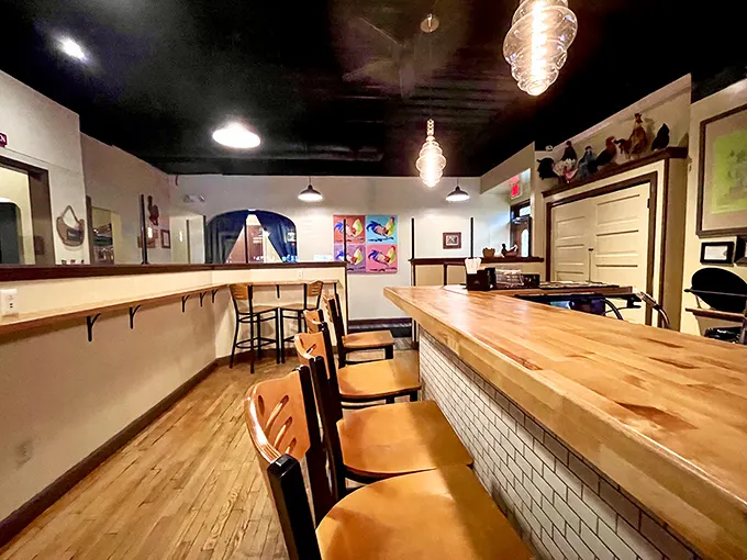 Warm wooden accents and stylish lighting create the perfect backdrop for culinary magic. Like a cozy hug with excellent taste.