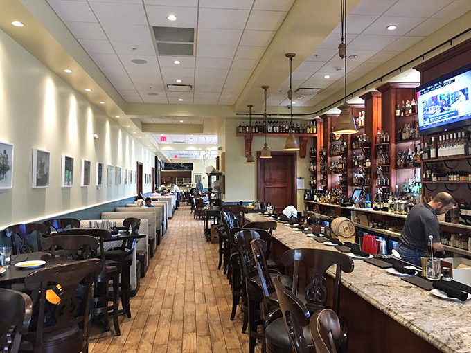 Where rustic meets refined: The Manship's warm wooden interior and well-stocked bar create the perfect backdrop for culinary adventures.