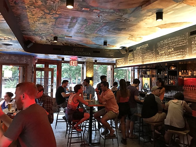 Where art meets appetite. The ceiling mural transforms an ordinary dining experience into something that feels like eating inside a living canvas.