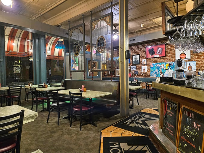 Where exposed brick meets stained glass, The Old Mohawk's interior feels like stepping into your favorite uncle's basement bar—if your uncle were a culinary genius.