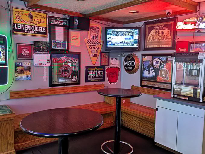 Beer signs and sports memorabilia create the perfect dive bar atmosphere – where calories don't count and napkins are considered essential survival gear.