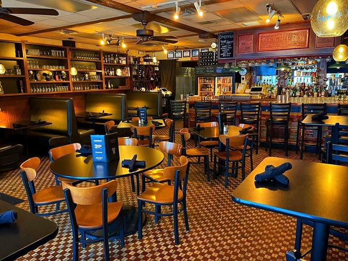 Step inside and discover warm wood tones, checkered floors, and that perfect neighborhood bistro vibe you've been searching for. Photo