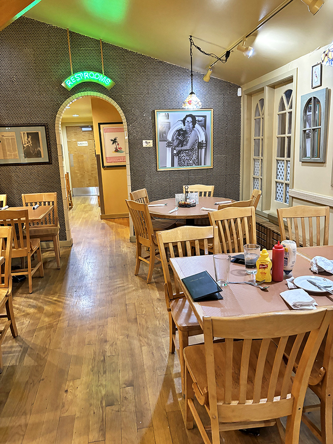 Step inside and you're transported to a simpler time, where wooden floors creak with stories and vintage photos watch over your meal.