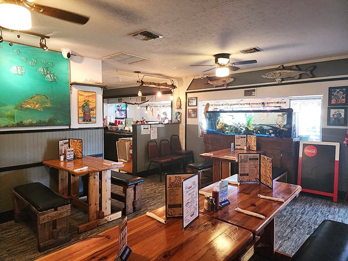 Inside, the nautical-themed dining room feels like the cozy galley of a beloved fishing boat that somehow sprouted tables and an aquarium.