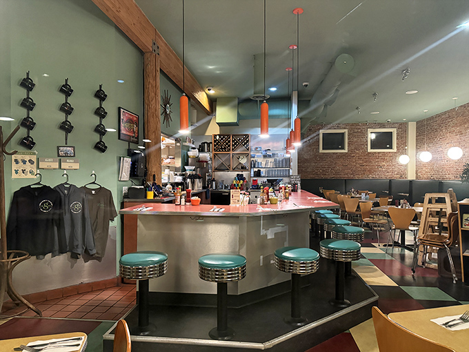 Classic diner meets modern comfort inside Geraldine's, where the counter seating invites solo diners to become part of the restaurant's daily story.