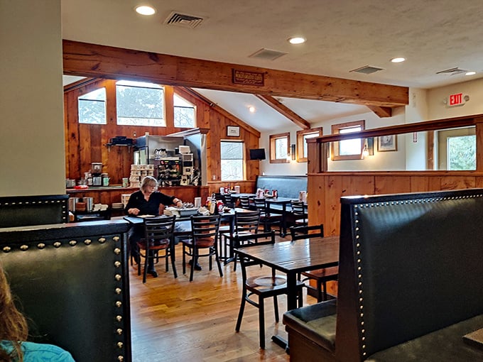 Warm wood paneling and exposed beams create that perfect diner ambiance—where conversations flow as freely as the coffee refills.