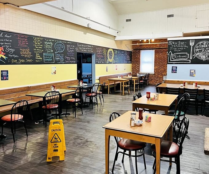 Chalkboard menus and exposed brick walls create the perfect backdrop for comfort food conversations—this is where memories are made between bites.