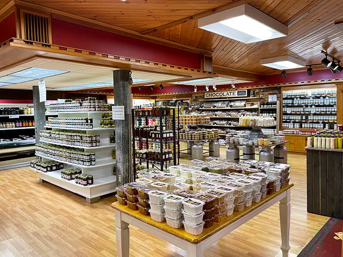 Inside, wooden beams and warm lighting create the perfect backdrop for food exploration. It's like walking into your grandma's kitchen—if grandma had an industrial cheese operation.