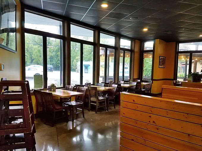 Warm wooden elements and natural light create the perfect backdrop for sandwich artistry. This isn't just eating—it's a communal experience.