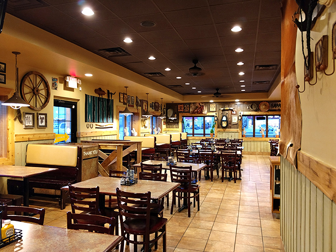 Western-themed décor meets Midwestern hospitality in this dining room where the only thing more inviting than the wagon wheel ambiance is the aroma of smoked meats.