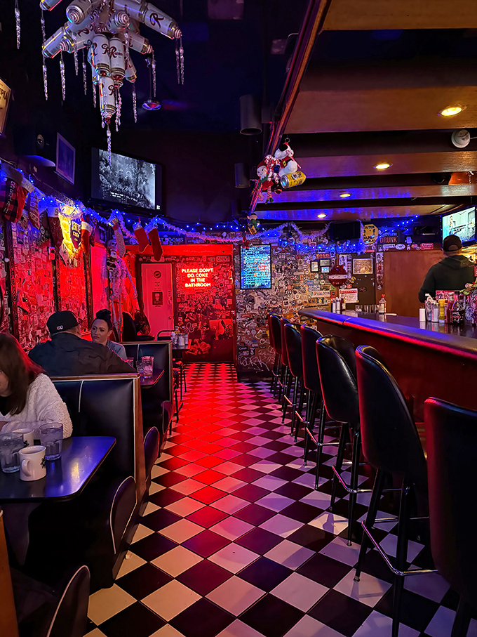 Step inside and the checkerboard floor leads you through a wonderland of memorabilia, red lighting, and decades of Seattle stories etched into every surface.