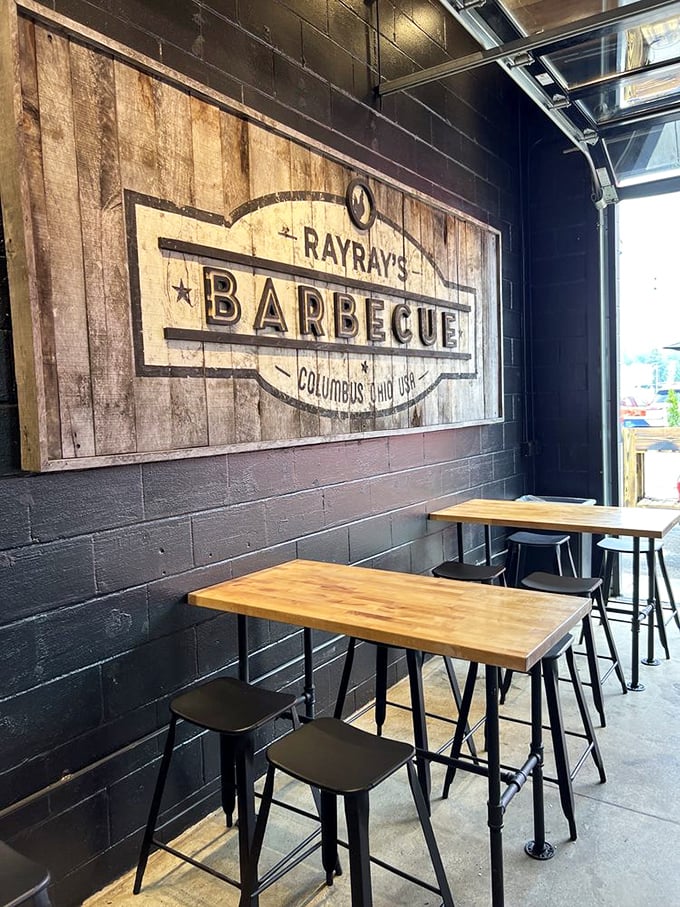 Simple wooden tables against black walls create the perfect backdrop for the star of the show—meat that demands your full attention.