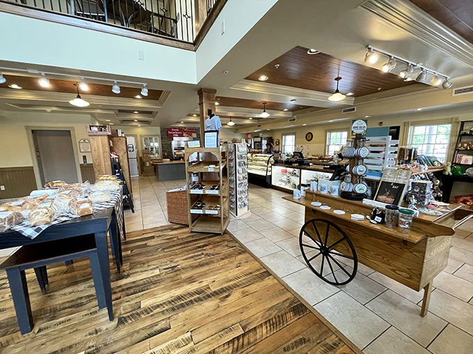 Where rustic meets refined. The bakery's interior combines wooden wagon wheels and modern display cases in a space that feels like your grandmother's kitchen—if grandma had industrial ovens.