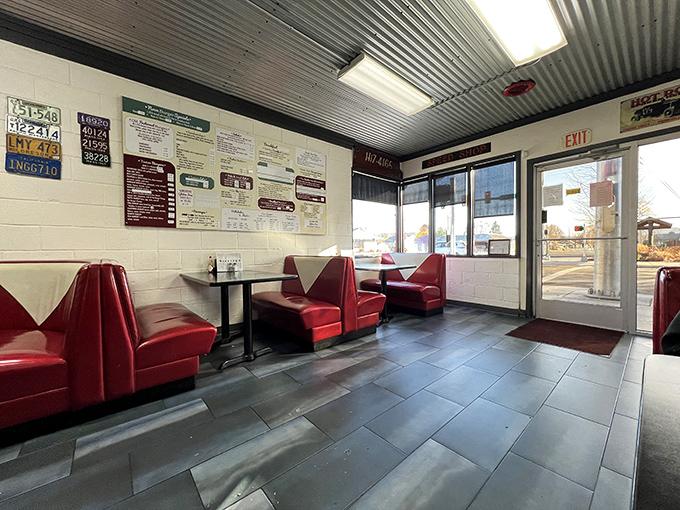Classic red vinyl booths and corrugated metal ceilings—this isn't retro by design, it's authentic by survival. Time capsule dining at its finest.