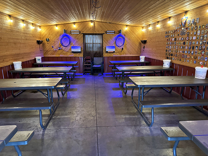 Simple wooden tables under warm lighting create the perfect stage for the real star of the show—what's about to arrive on your plate.