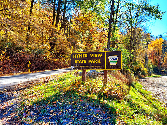 Fall's color palette at its finest. This unassuming entrance sign is like finding the door to Narnia—ordinary until you step through.