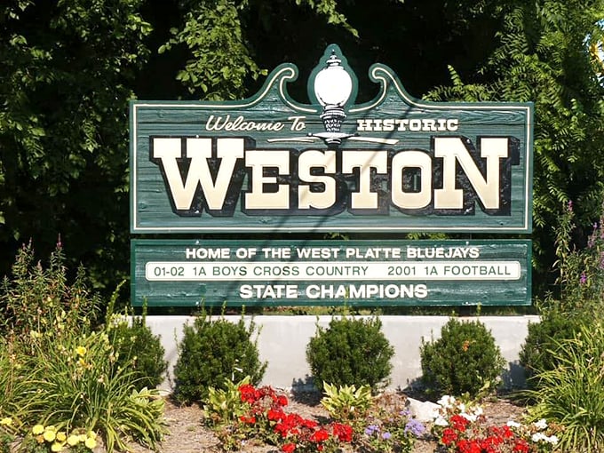 Not just a sign, but a promise. Weston proudly displays its small-town achievements alongside its welcome – because in places like this, community still matters.