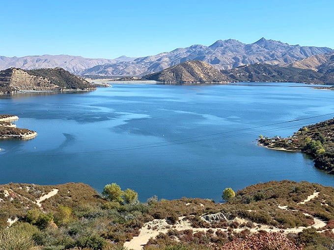 Silverwood Lake's sapphire waters create a stunning contrast against the rugged mountains—nature's version of a perfect Instagram filter.