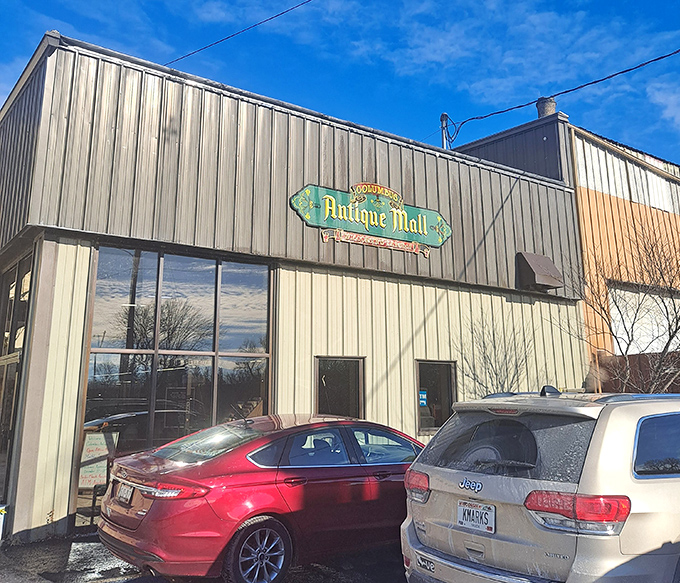 Blue skies and vintage signs – the perfect Wisconsin day trip begins with this modest facade hiding historical wonders within.