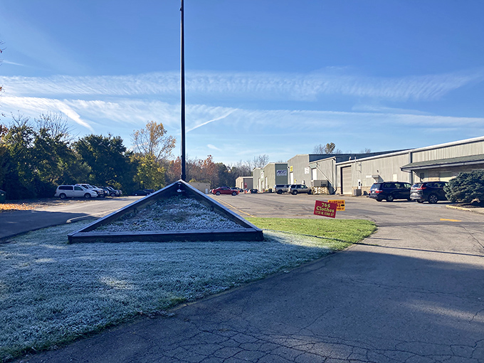 Morning frost dusts the landscape outside this bargain hunter's paradise. The parking lot fills early on markdown days—seasoned shoppers know timing is everything.