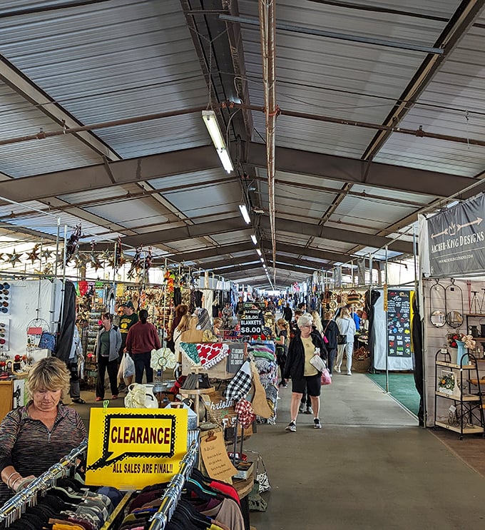 Bargain hunters navigate the labyrinth of vendors with the focused determination of archaeologists on the verge of discovery.