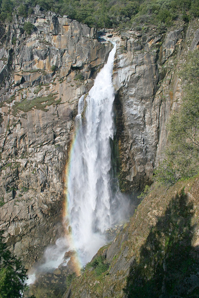 Mother Nature showing off her best work—a 410-foot waterfall creating its own rainbow, as if saying "You're welcome" to hikers who made the journey.