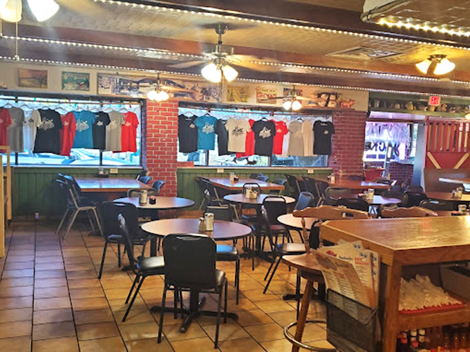 Simple tables, colorful t-shirts for sale, and the promise of comfort food. This dining room has hosted countless morning conversations and coffee refills.